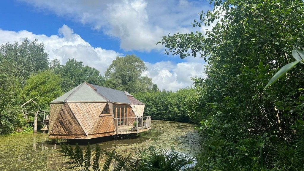 Geometric Cabin On Lake For Filming